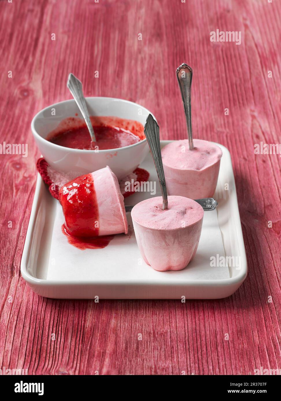 Homemade strawberry ice lolly with strawberry sauce Stock Photo - Alamy