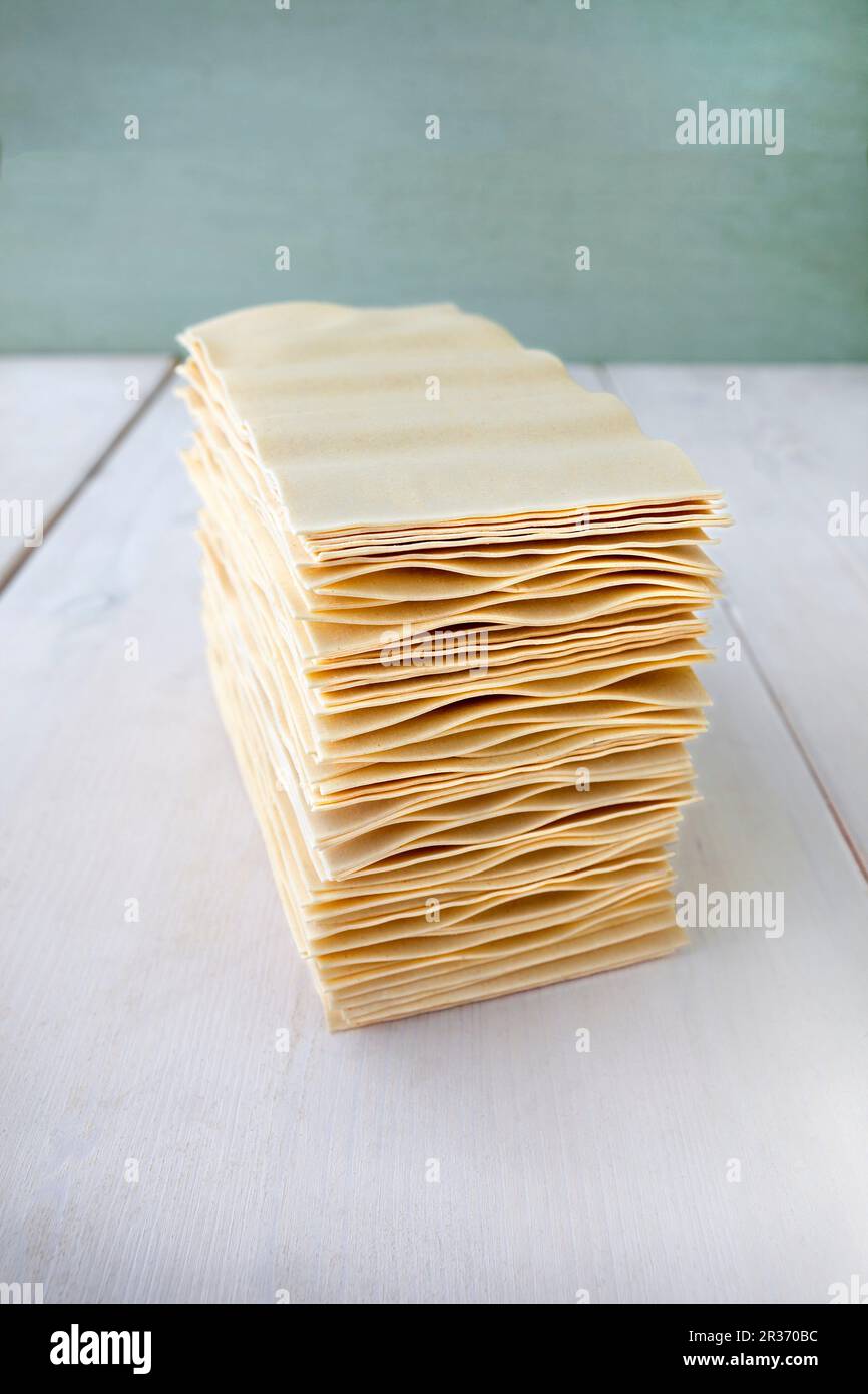 A stack of lasagne sheets Stock Photo - Alamy