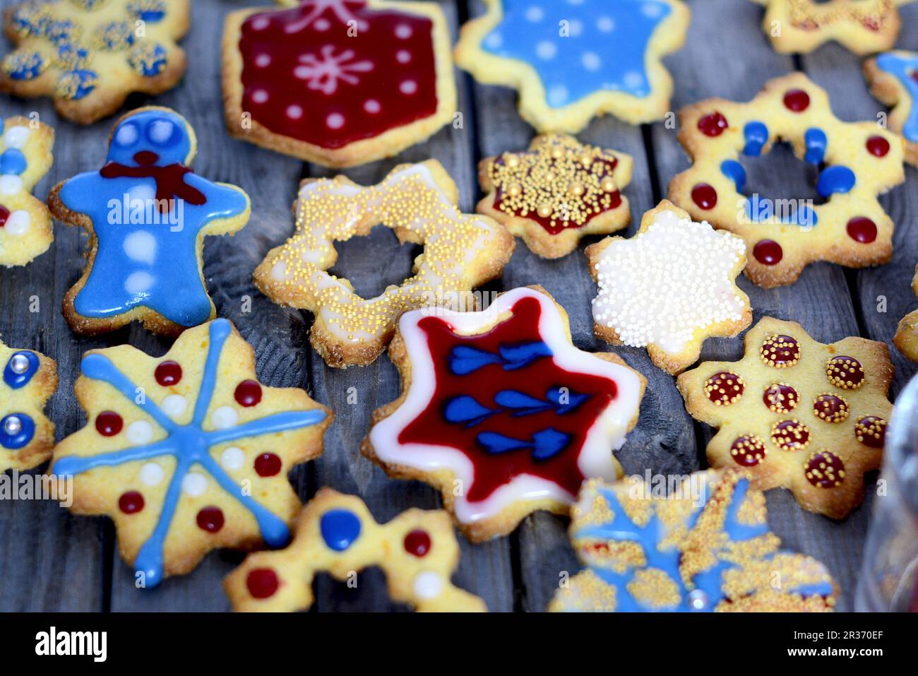 Assorted gingerbread biscuits with colourful icing Stock Photo - Alamy