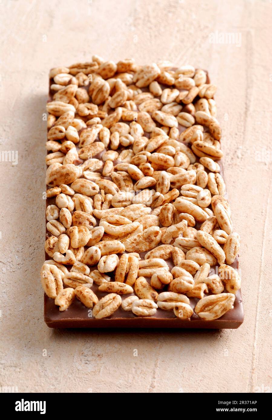 A bar of chocolate with puffed rice Stock Photo - Alamy