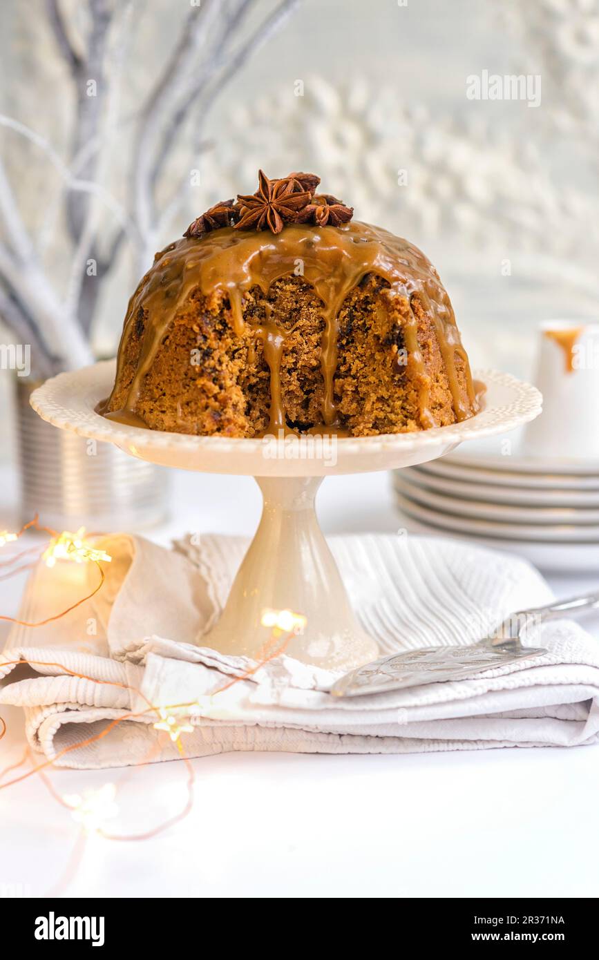 Steamed ginger and date pudding drizzled with toffee sauce and ...