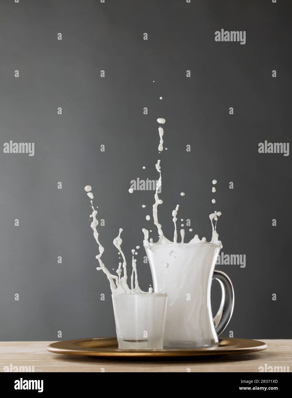 Milk glass dripping splash hi-res stock photography and images - Alamy