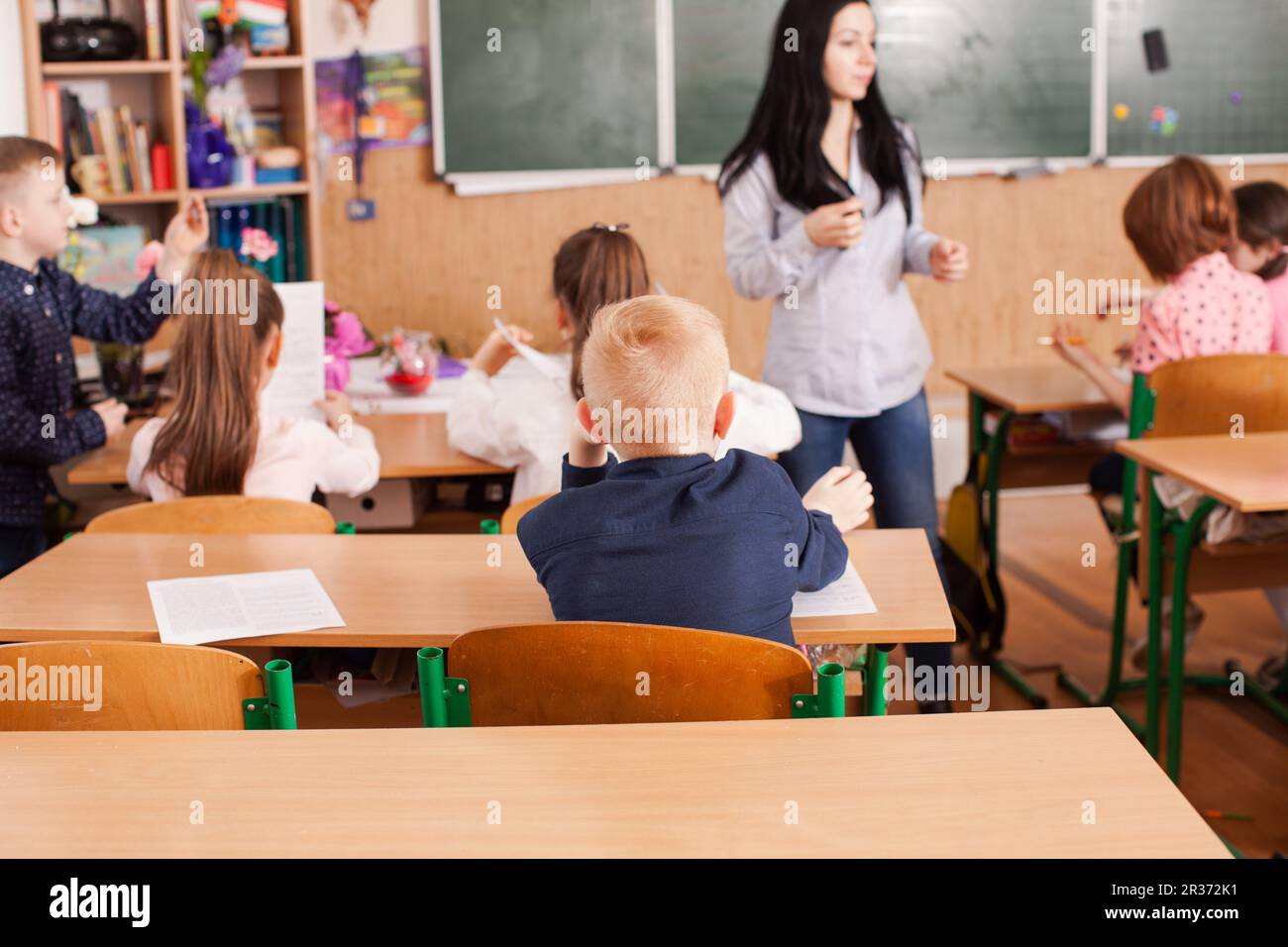 Teacher starts the lesson Stock Photo - Alamy