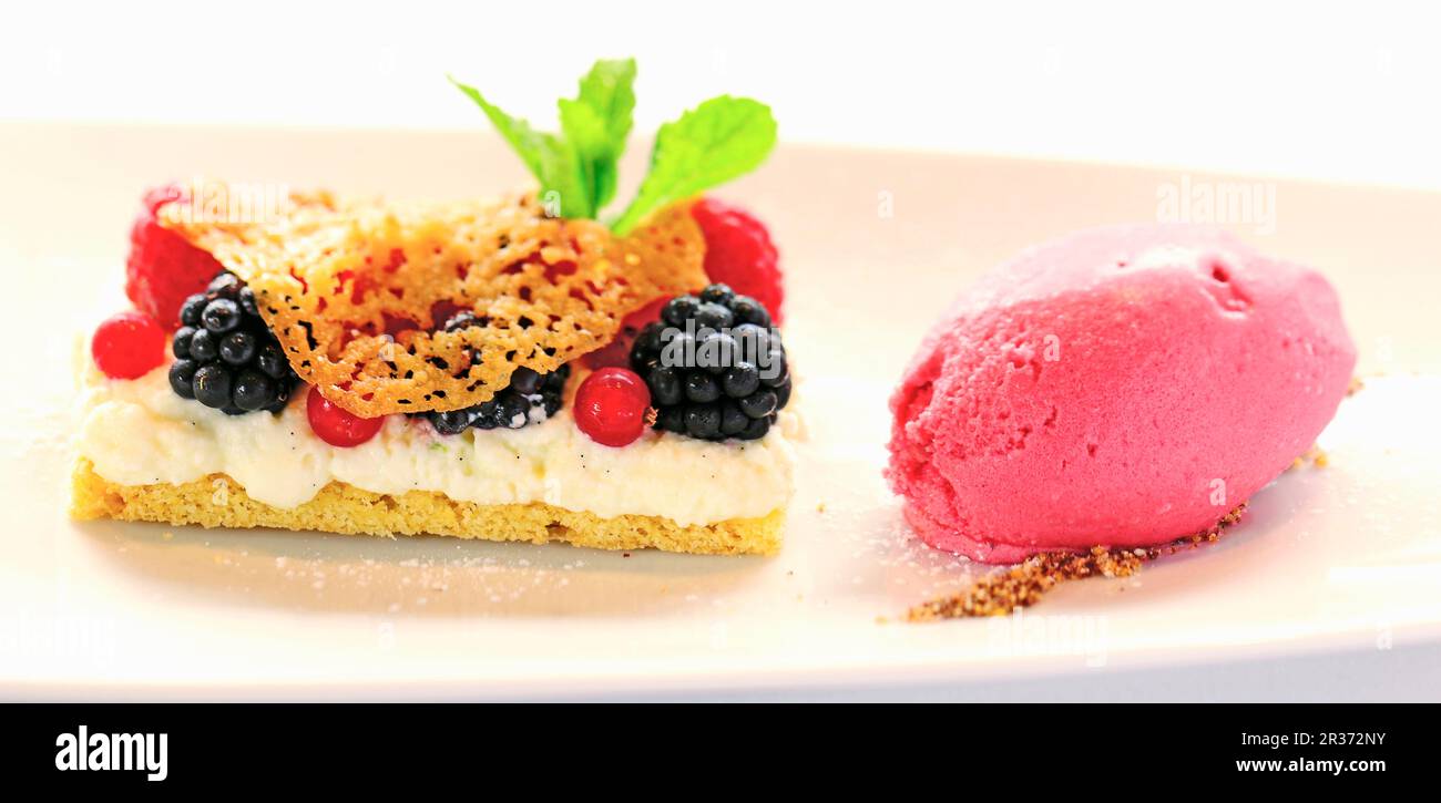 A berry slice with raspberry ice cream Stock Photo - Alamy