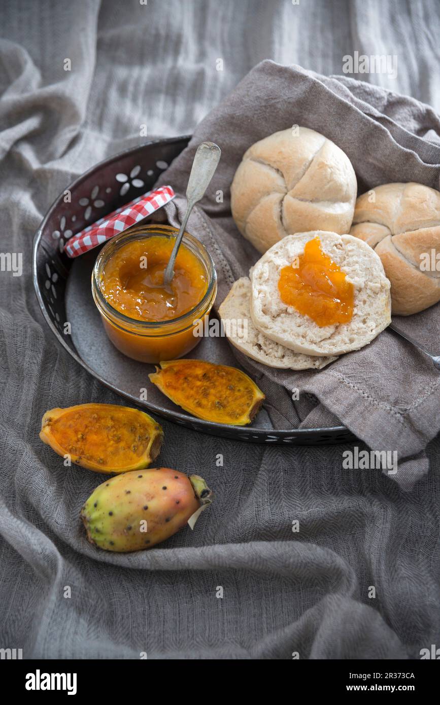 Homemade vegan prickly pear jam with crusty bread roll halves Stock ...