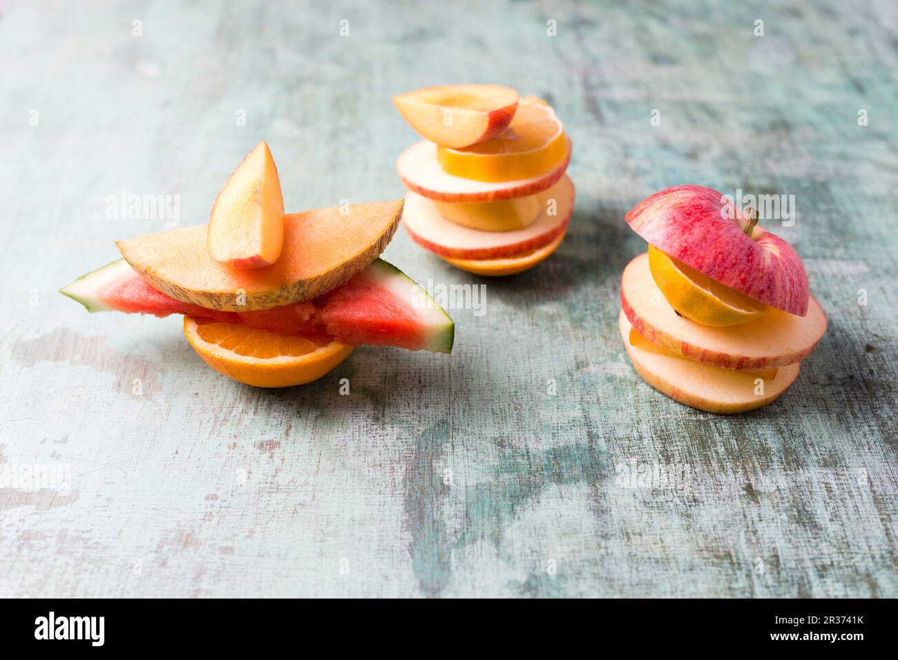 Fruit stacks with apple, watermelon, lemon, orange and banana Stock ...