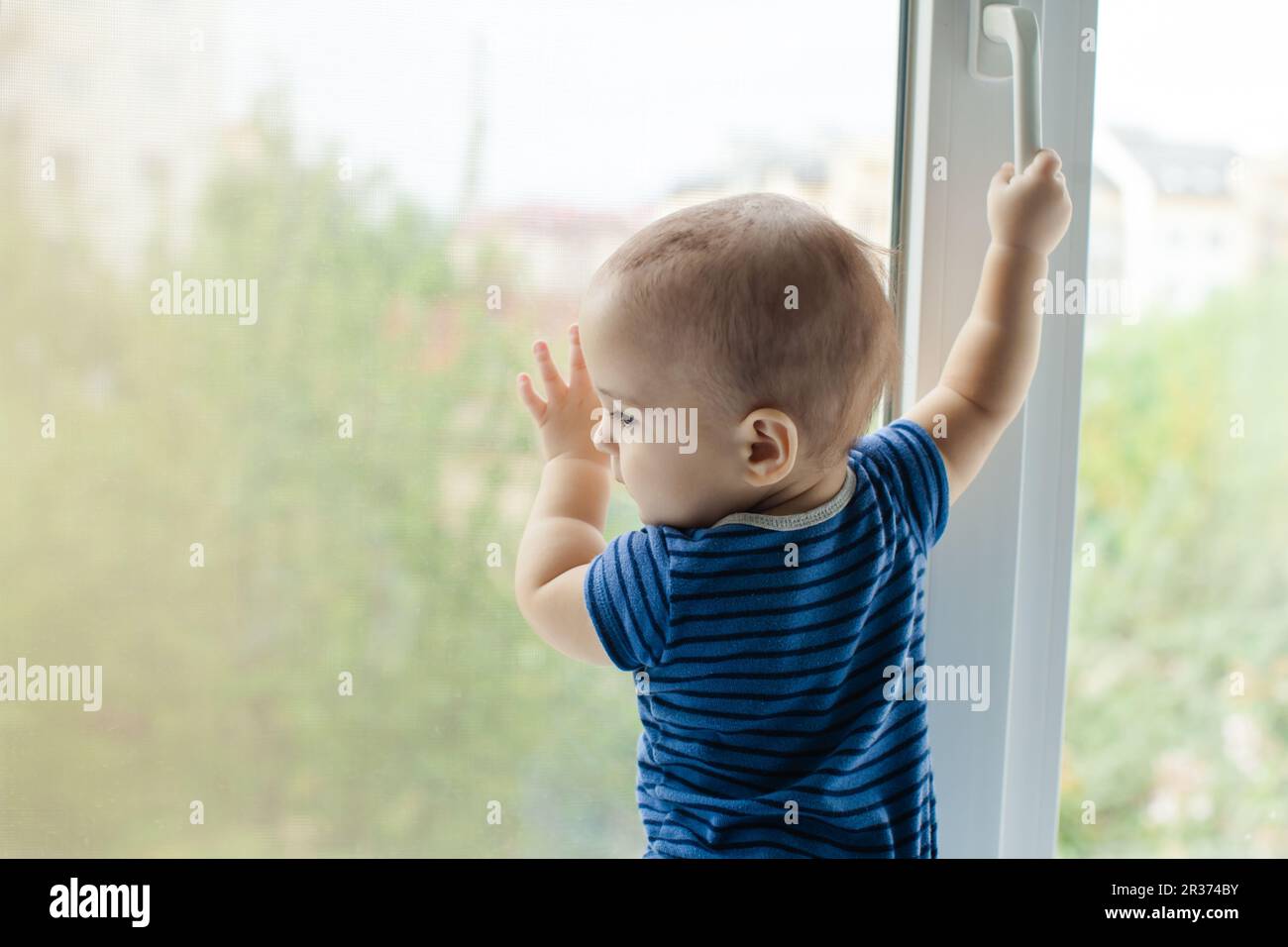 Little boy in danger Stock Photo - Alamy