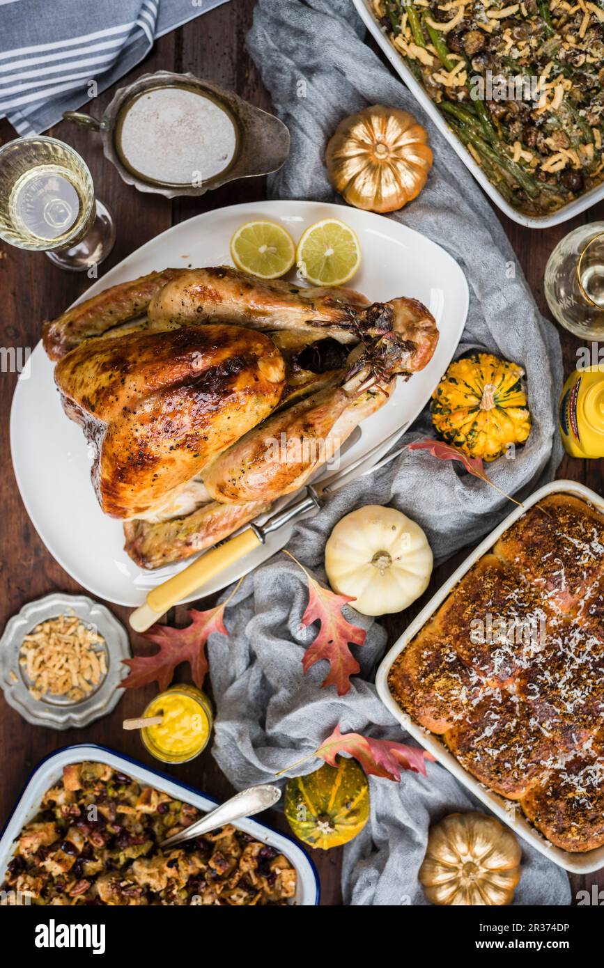 A roast turkey with side dishes for Thanksgiving Stock Photo - Alamy