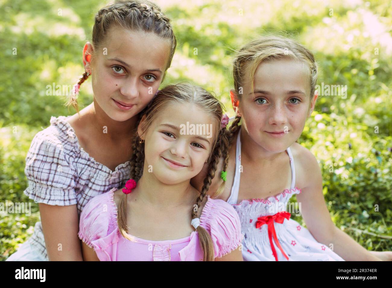 Three girls outdoors Stock Photo - Alamy