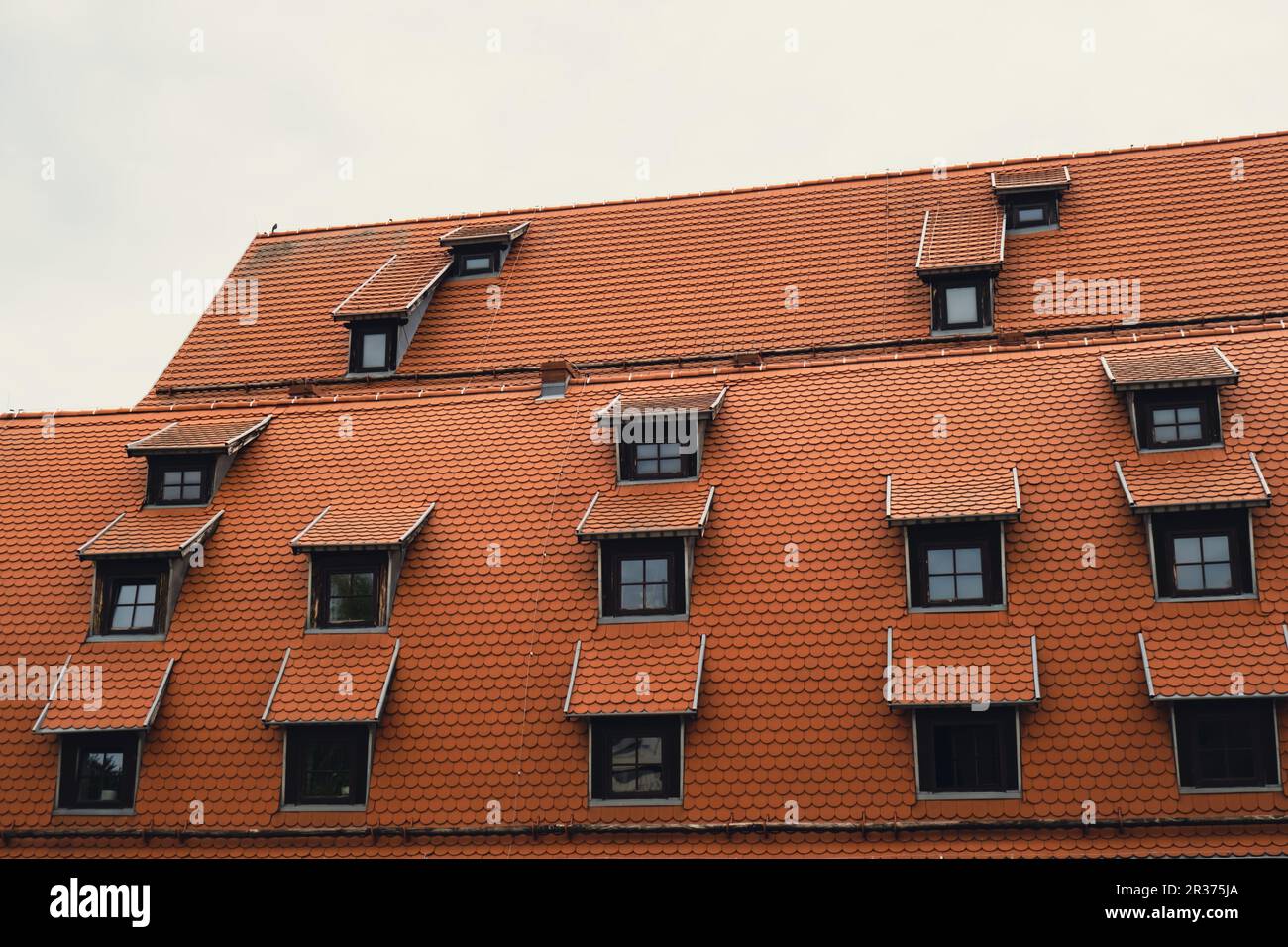 Corner with dormers Red Roofs of the city brown metal tiles roof of ...