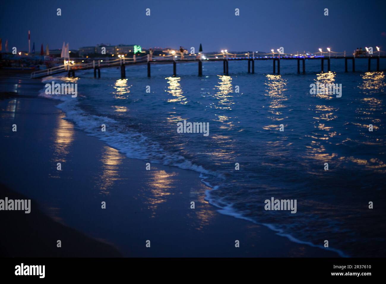 Romantic pier at night Stock Photo - Alamy
