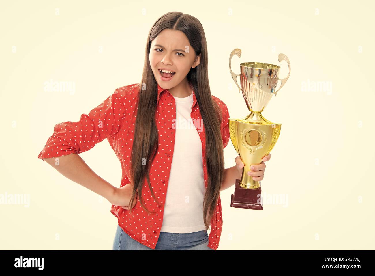 Girl with win cup. Teen holding a trophy. Kid winner child won the ...