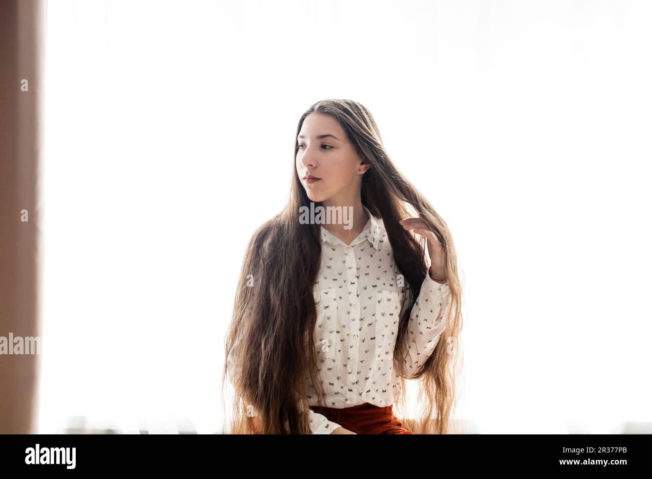 Very long hair Stock Photo - Alamy
