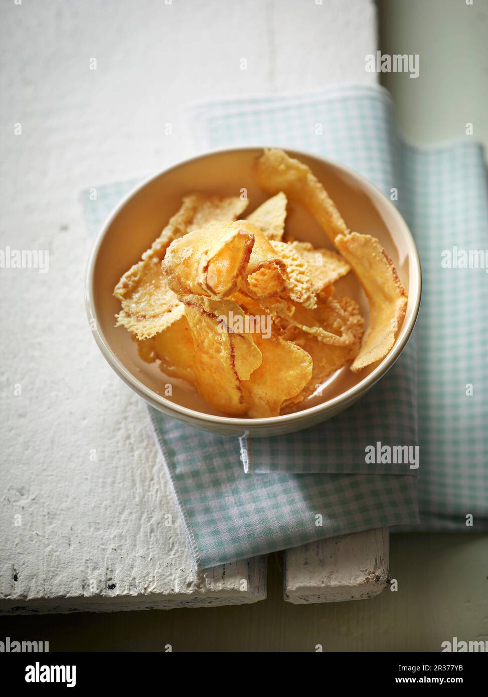 Cheesy chips in a bowl Stock Photo - Alamy
