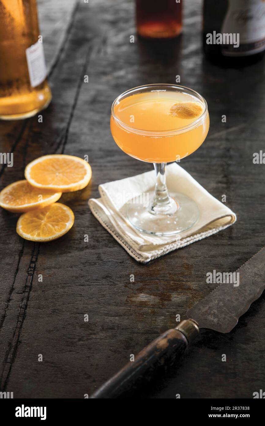 A champagne cocktail with orange garnish Stock Photo - Alamy