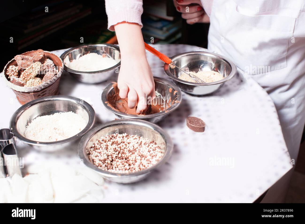 Little chef prepare chocolates Stock Photo - Alamy