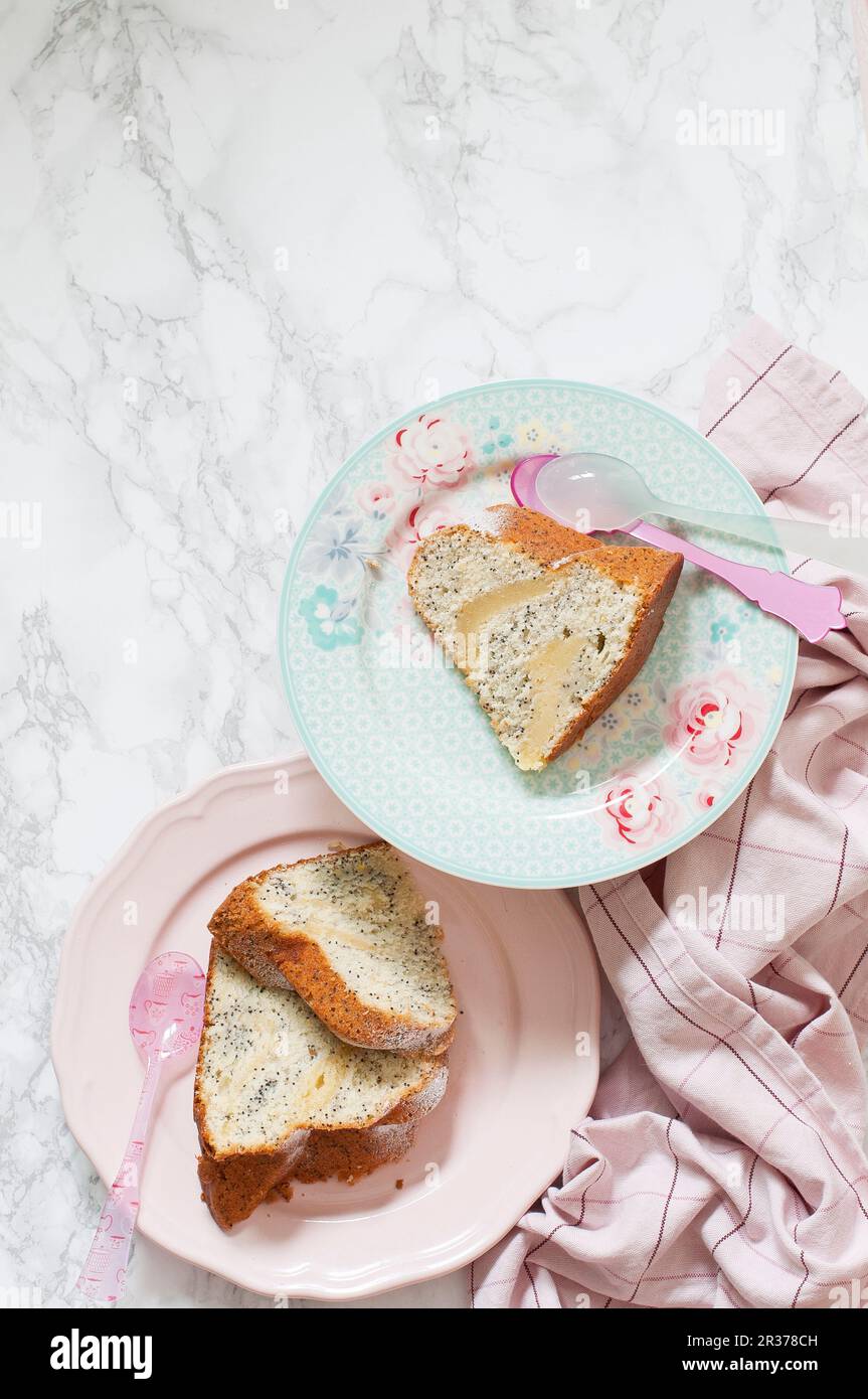 Lemon curd and poppy seed Bundt cake Stock Photo - Alamy