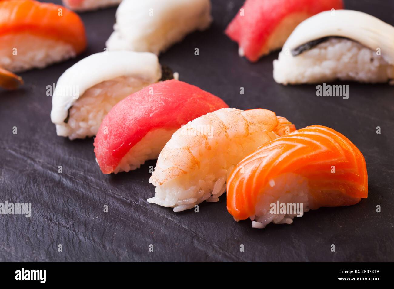 Set of four sushi Stock Photo - Alamy