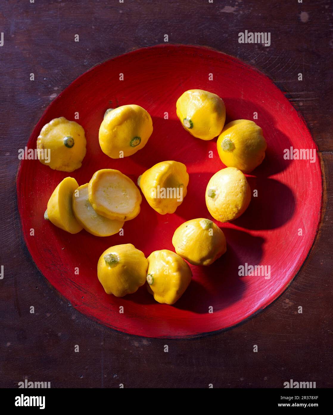 Mini pumpkins (Zimbabwe) in a red wooden bowl Stock Photo - Alamy