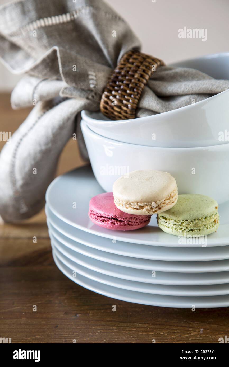 Macarons on a stack of plates Stock Photo - Alamy