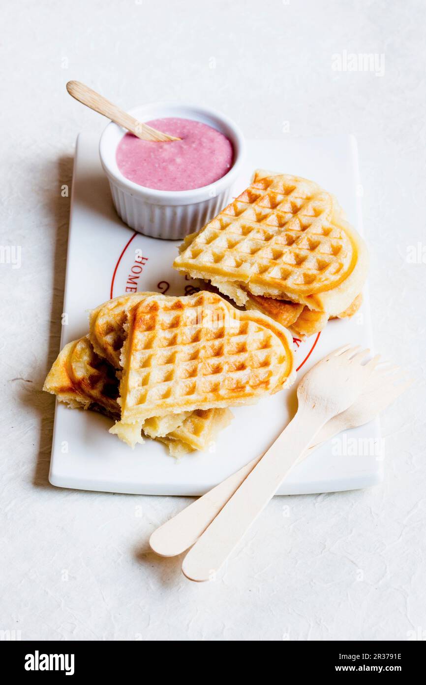 Heart shaped waffles with cherry sauce Stock Photo - Alamy