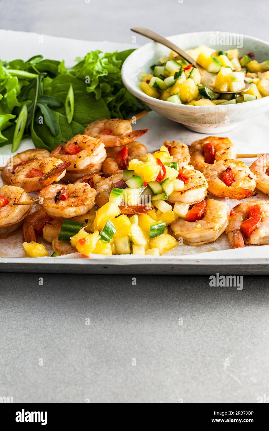 Prawn Kebabs with Pineapple and Chilli Salsa Stock Photo - Alamy