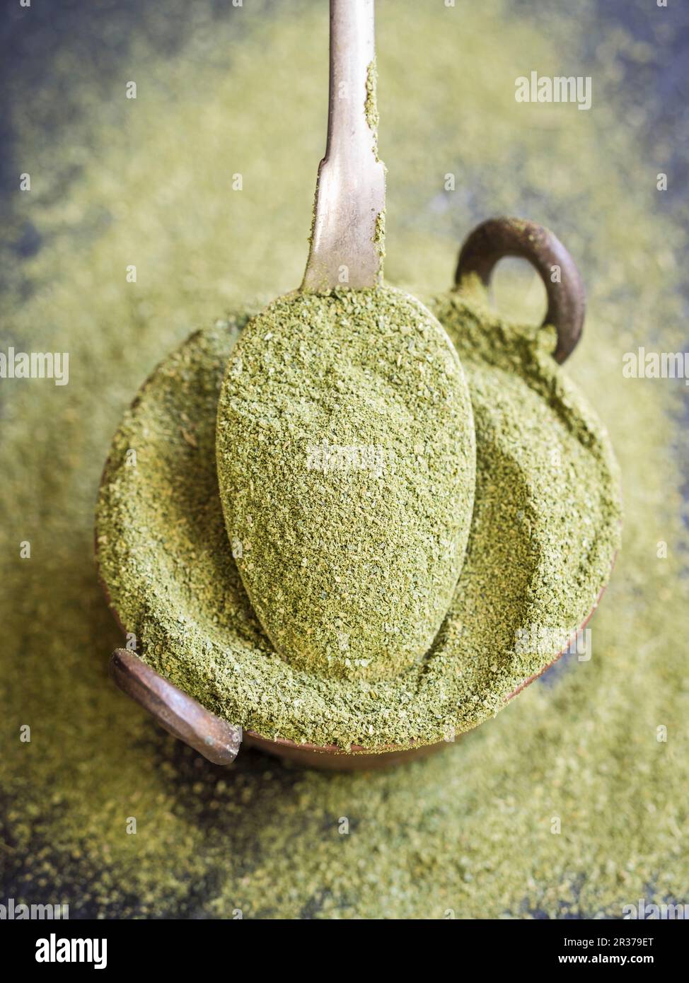Moringa powder on spoon hi-res stock photography and images - Alamy