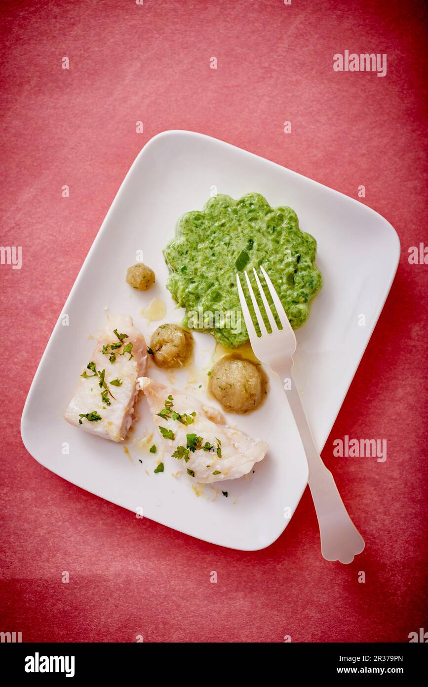 Fish fillet with a bean flan Stock Photo - Alamy