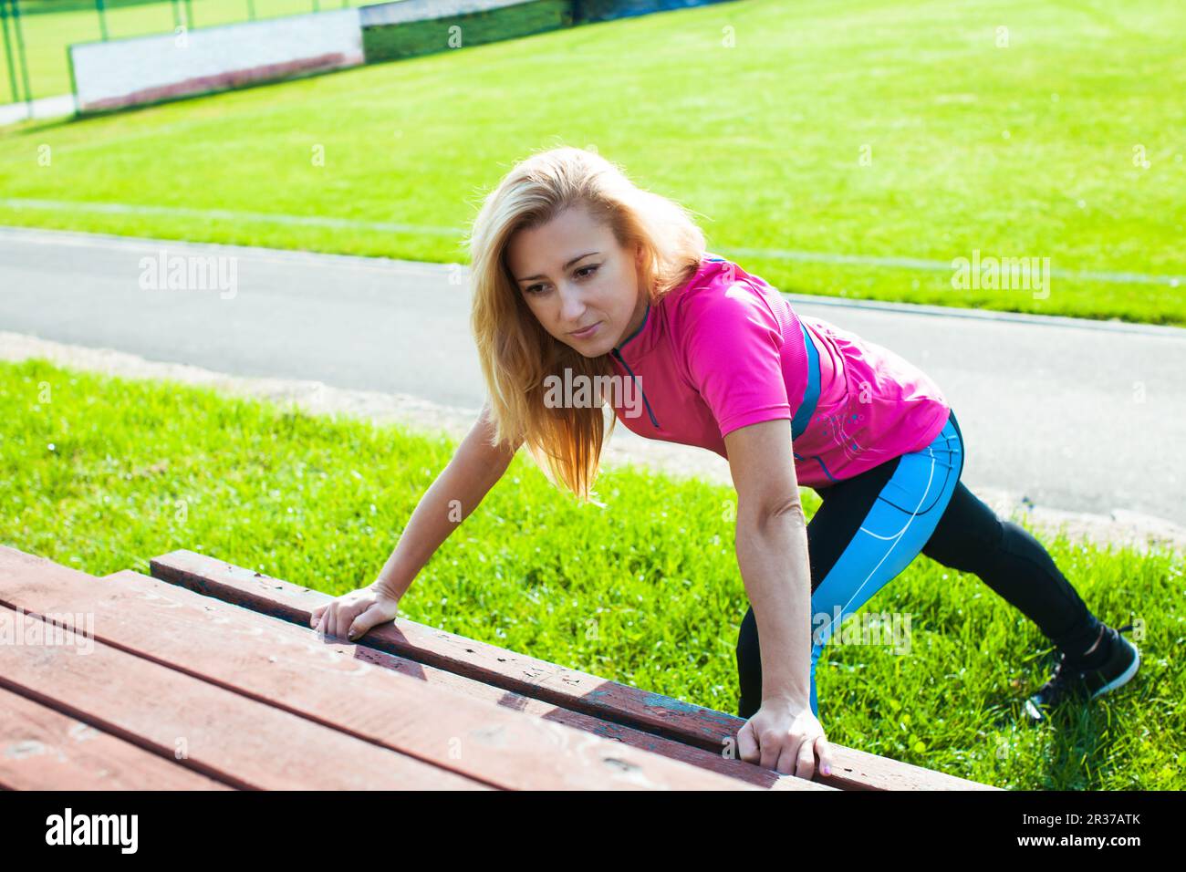 Two women push hi-res stock photography and images - Alamy