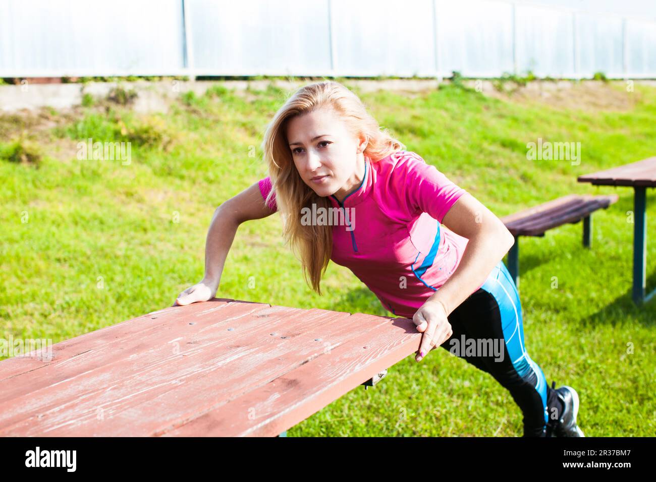 Young women doing exercise hi-res stock photography and images - Alamy