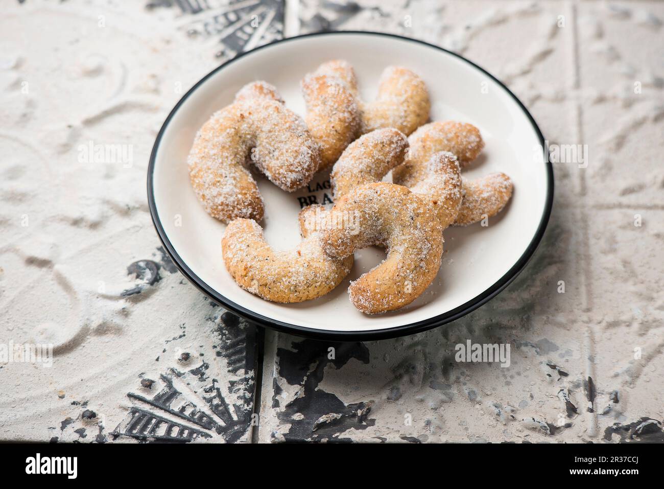 A plate of vanilla crescent biscuits Stock Photo - Alamy