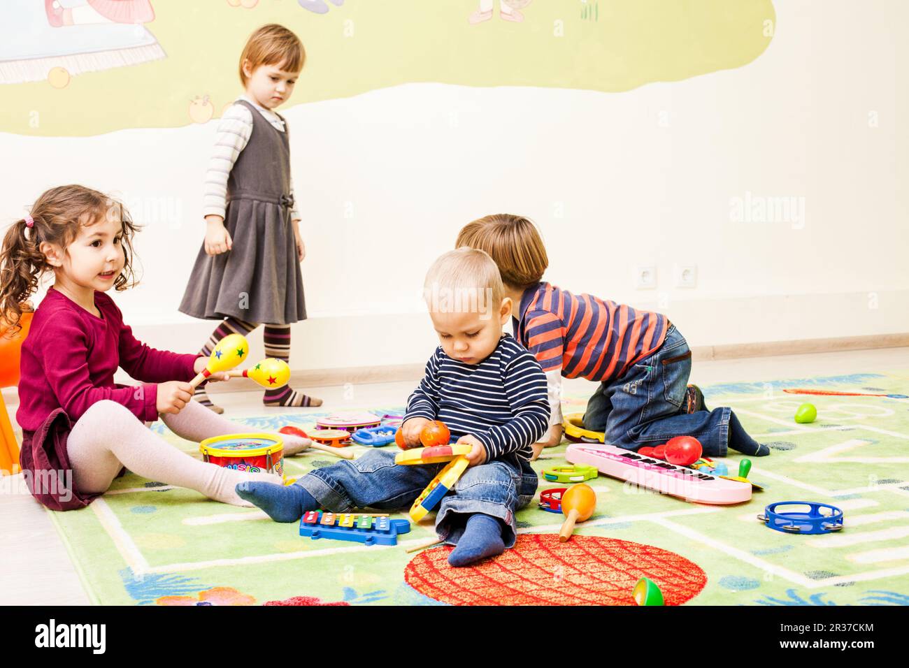 Three kids playing hi-res stock photography and images - Alamy