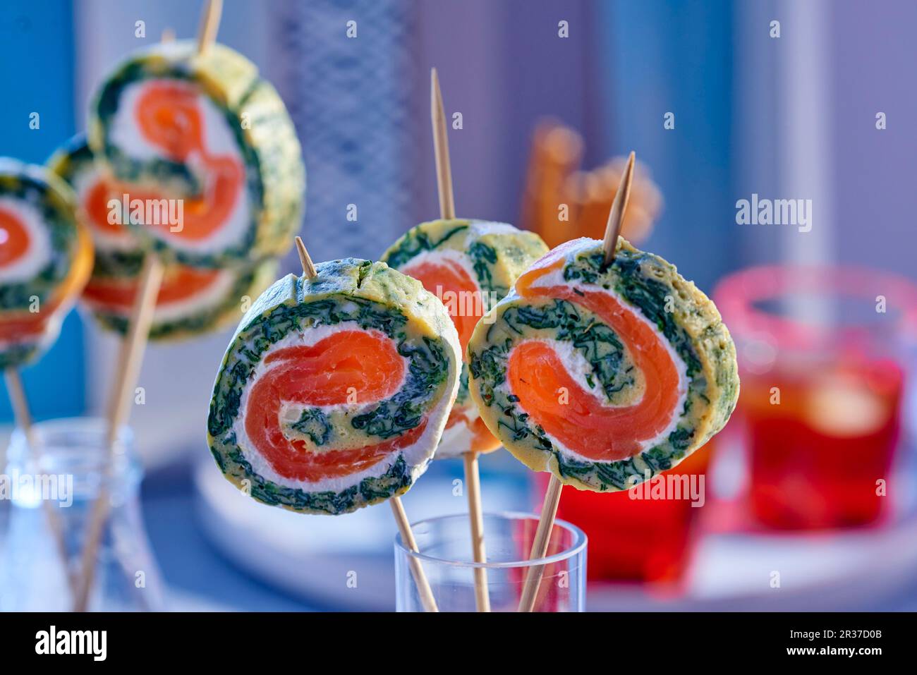 Omelette rolls with wasabi and smoked salmon (party food Stock Photo ...