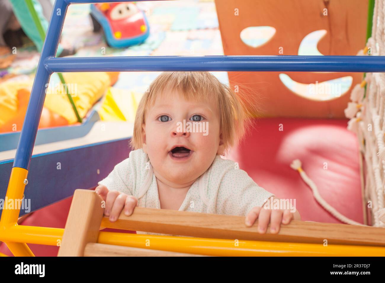 The baby playing on the playground Stock Photo - Alamy