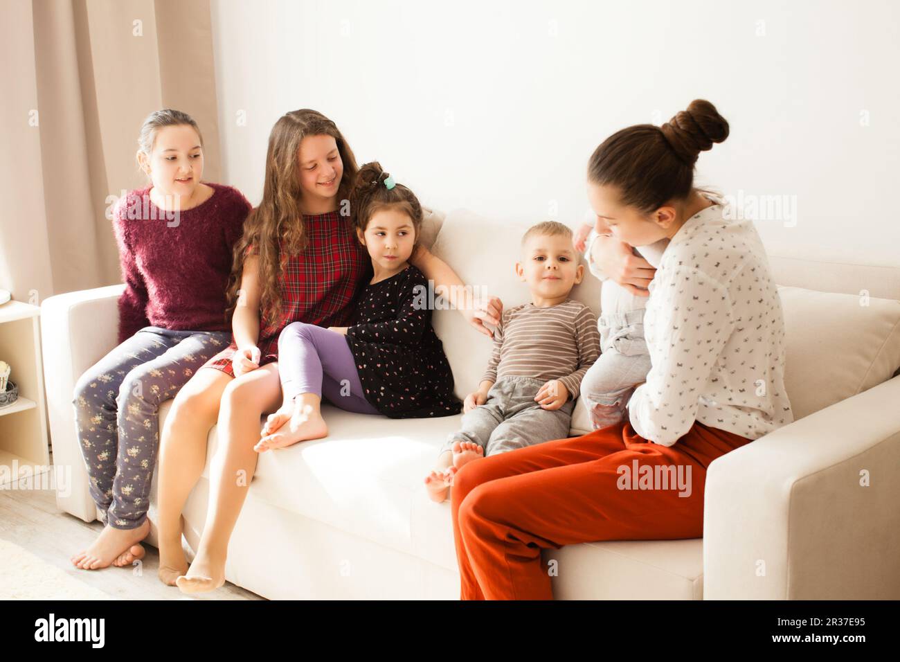 Big family of siblings Stock Photo - Alamy