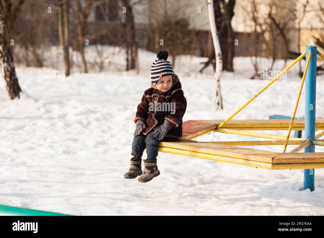 Kid on winter walk Stock Photo - Alamy