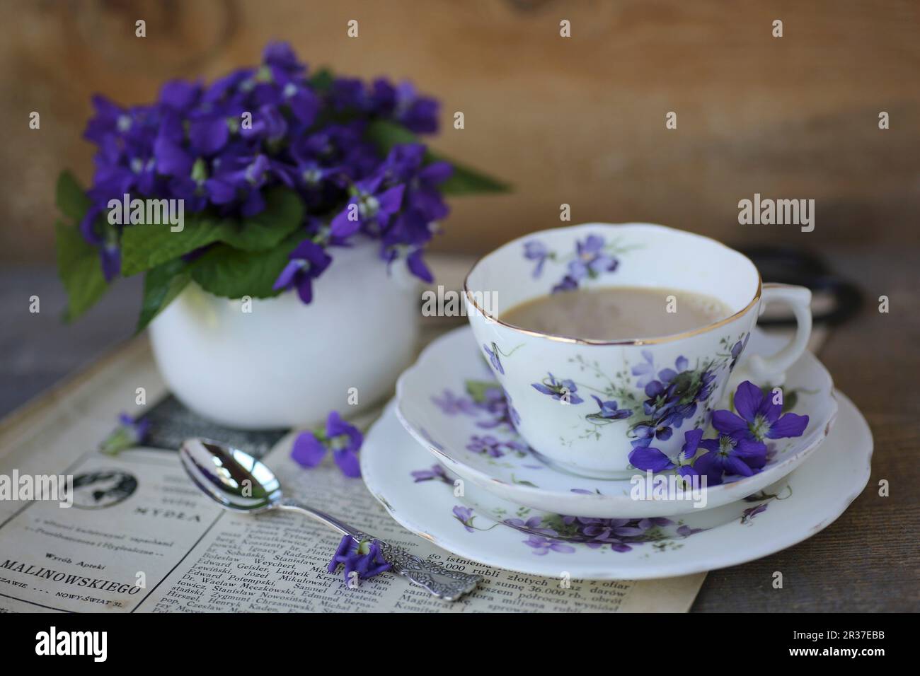 A cup of coffee and violets Stock Photo - Alamy
