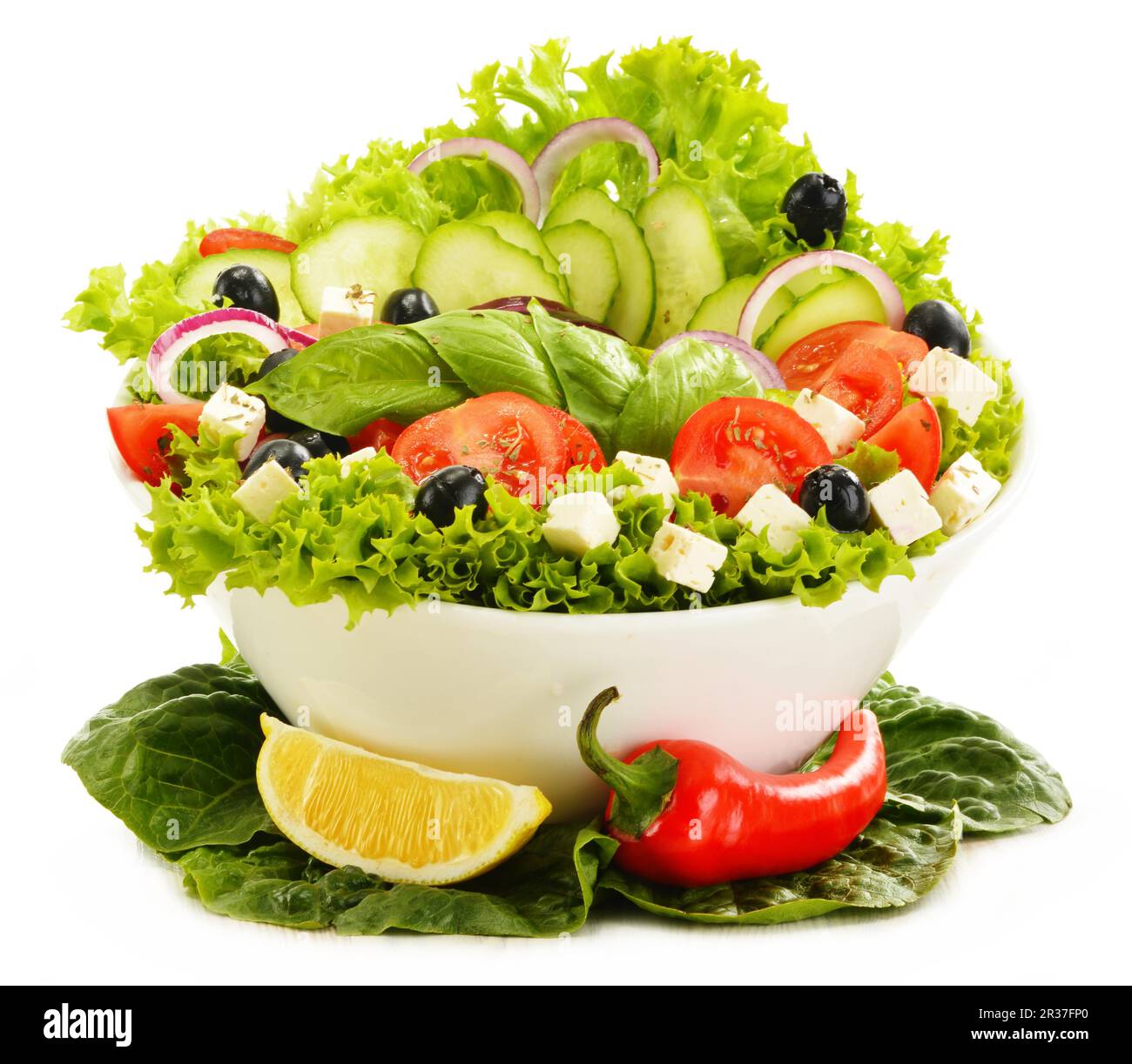 Vegetable salad bowl isolated on white Stock Photo - Alamy