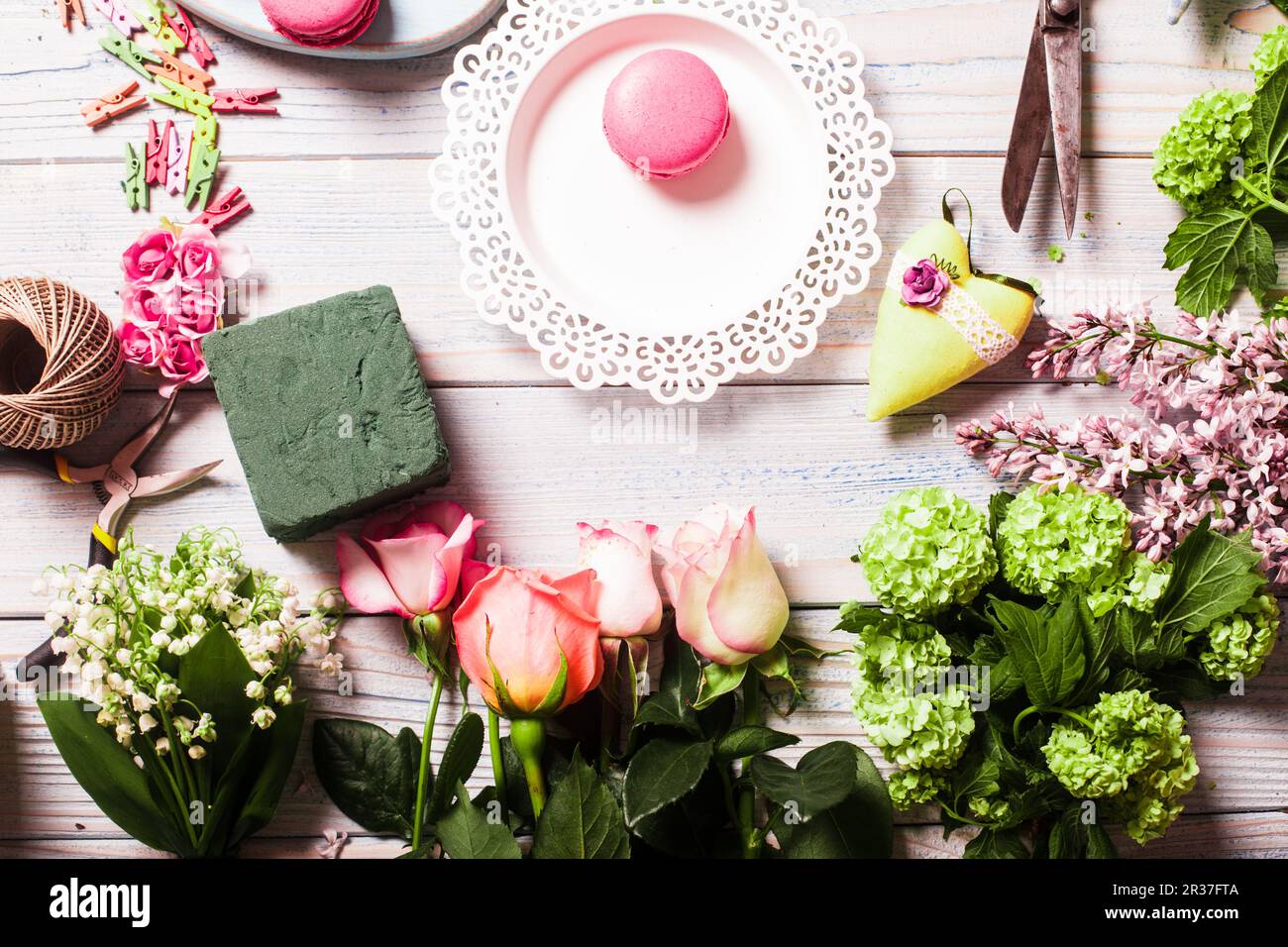 Box with flowers and macaroons Stock Photo - Alamy
