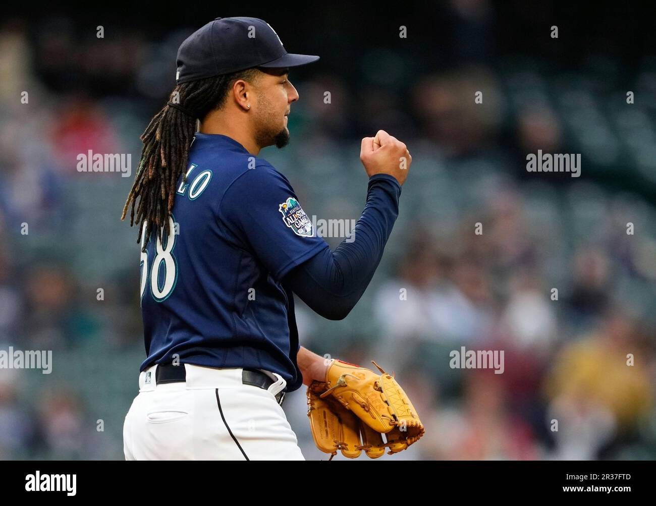 Seattle Mariners starting pitcher Luis Castillo reacts after striking ...
