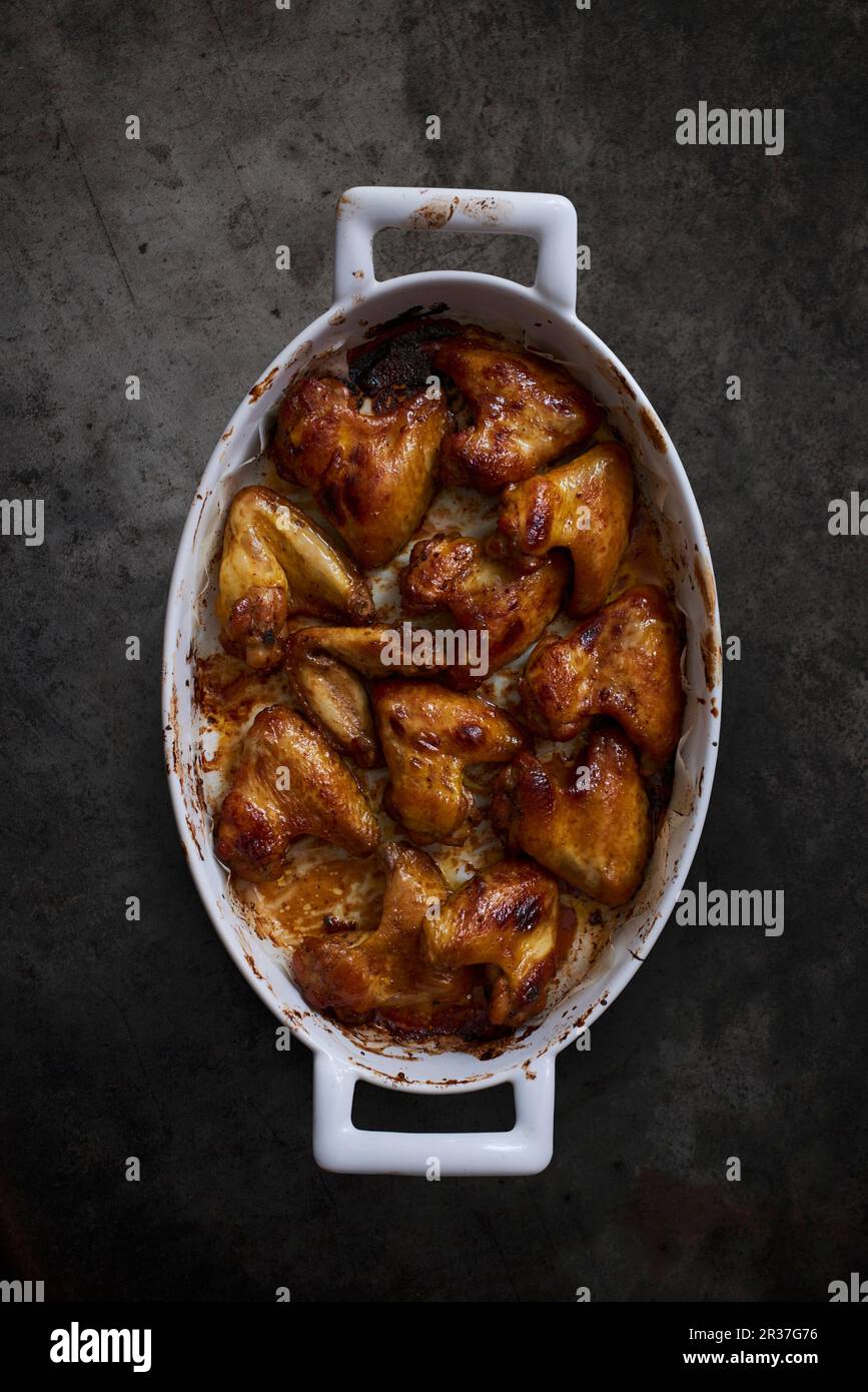 Chicken wings roasted in oven hi-res stock photography and images - Alamy