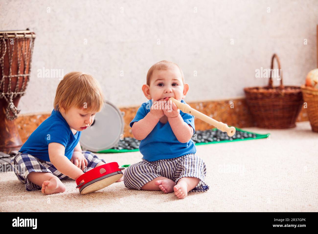 Boys with musical instruments Stock Photo - Alamy