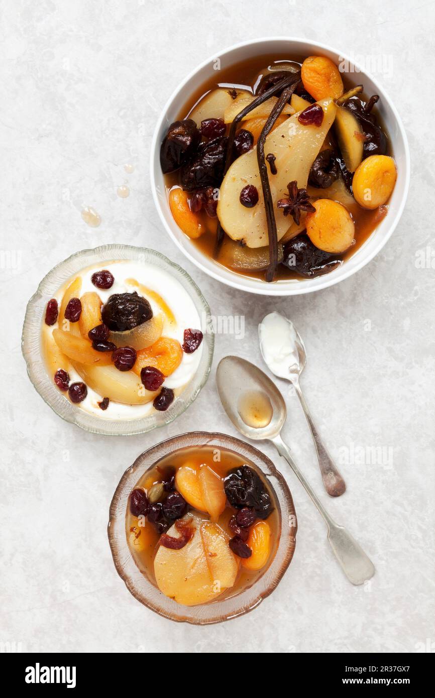 Pear Dried Fruit Compote with yoghurt Stock Photo - Alamy