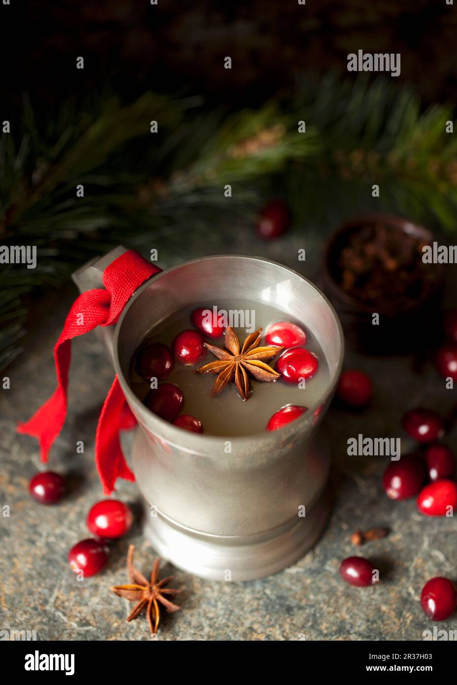 Warm Mulled Apple Juice with Cranberries Stock Photo - Alamy