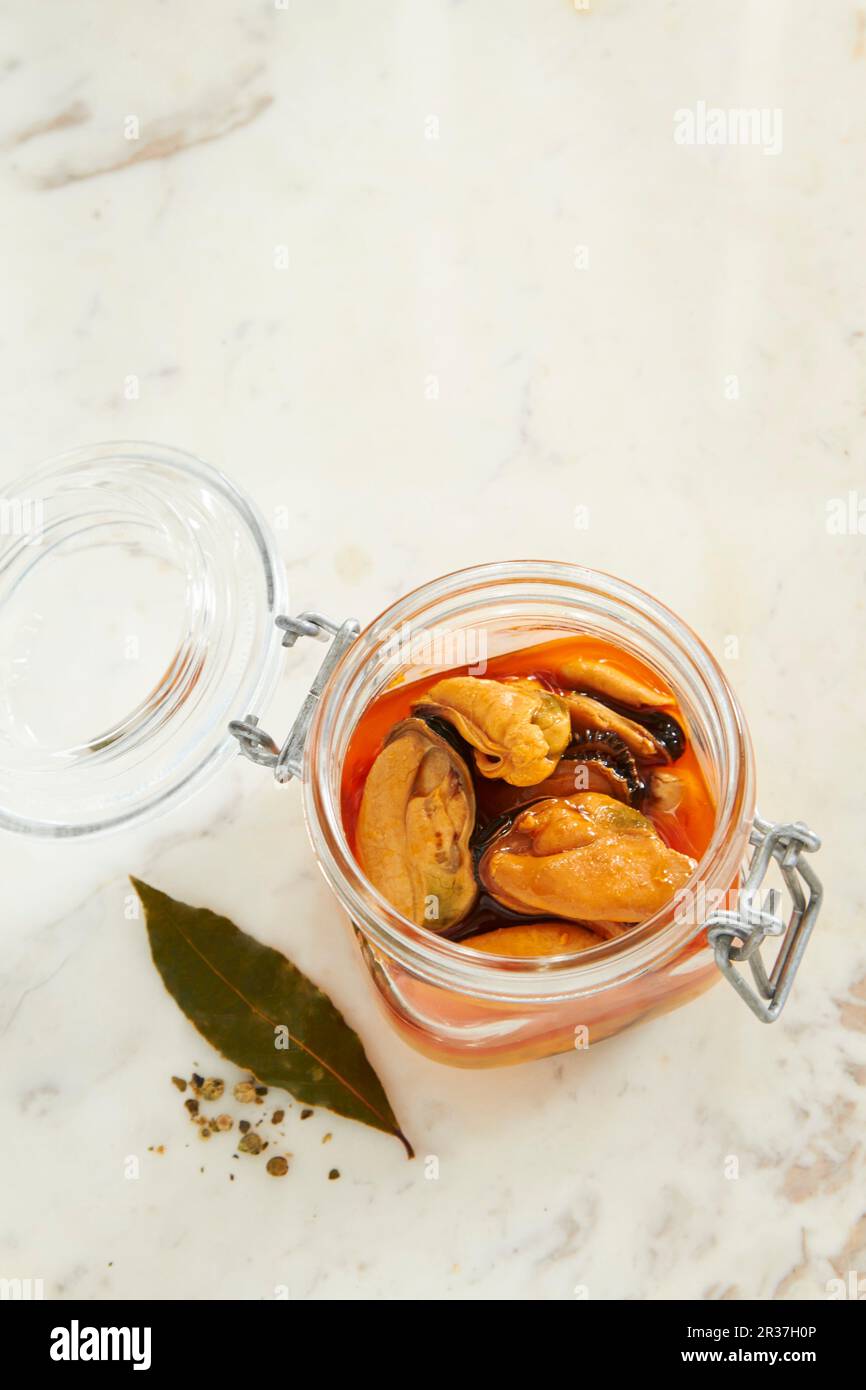 Pickled mussels in a glass jar Stock Photo - Alamy