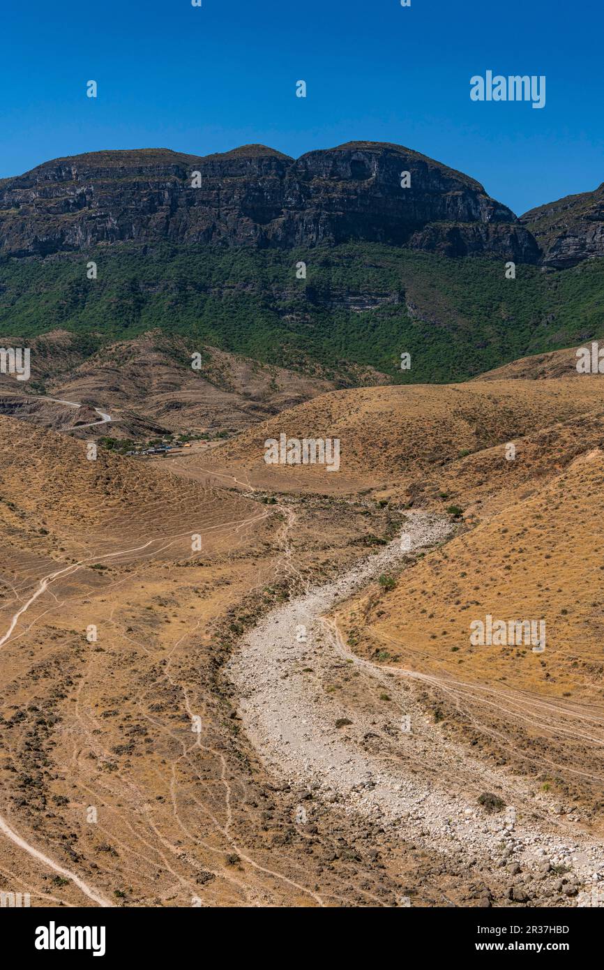 Dry river before the green rock cliffs, Salalah, Oman Stock Photo - Alamy