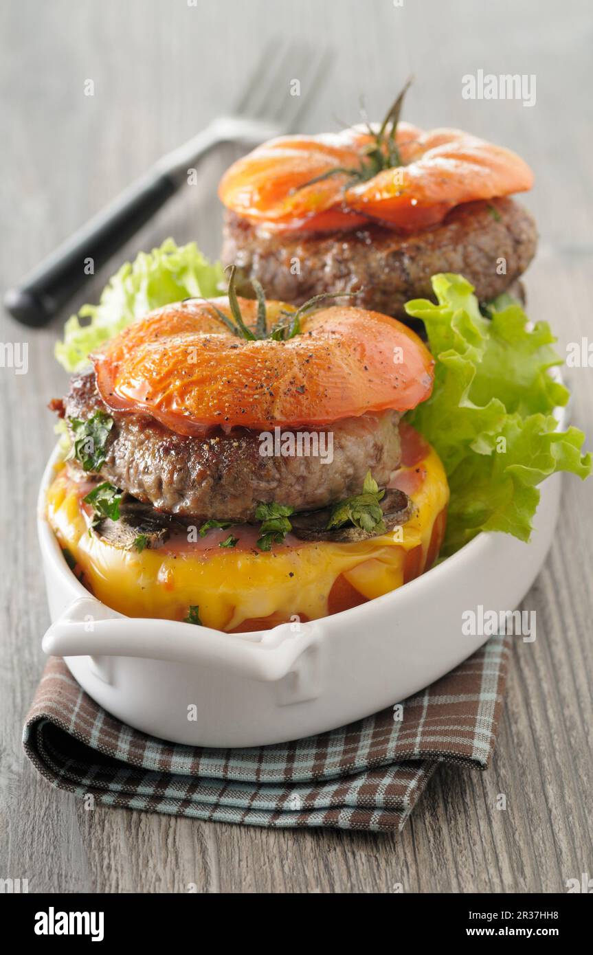 Tomato burgers with cheese Stock Photo - Alamy