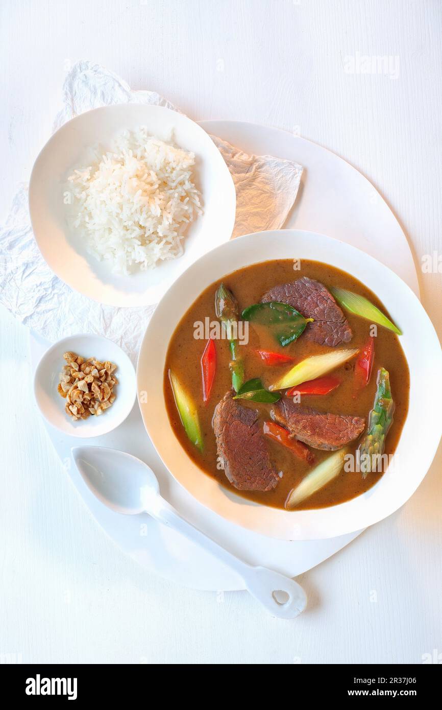 Beef with basmati rice in coconut sauce with peanuts (Thailand Stock ...