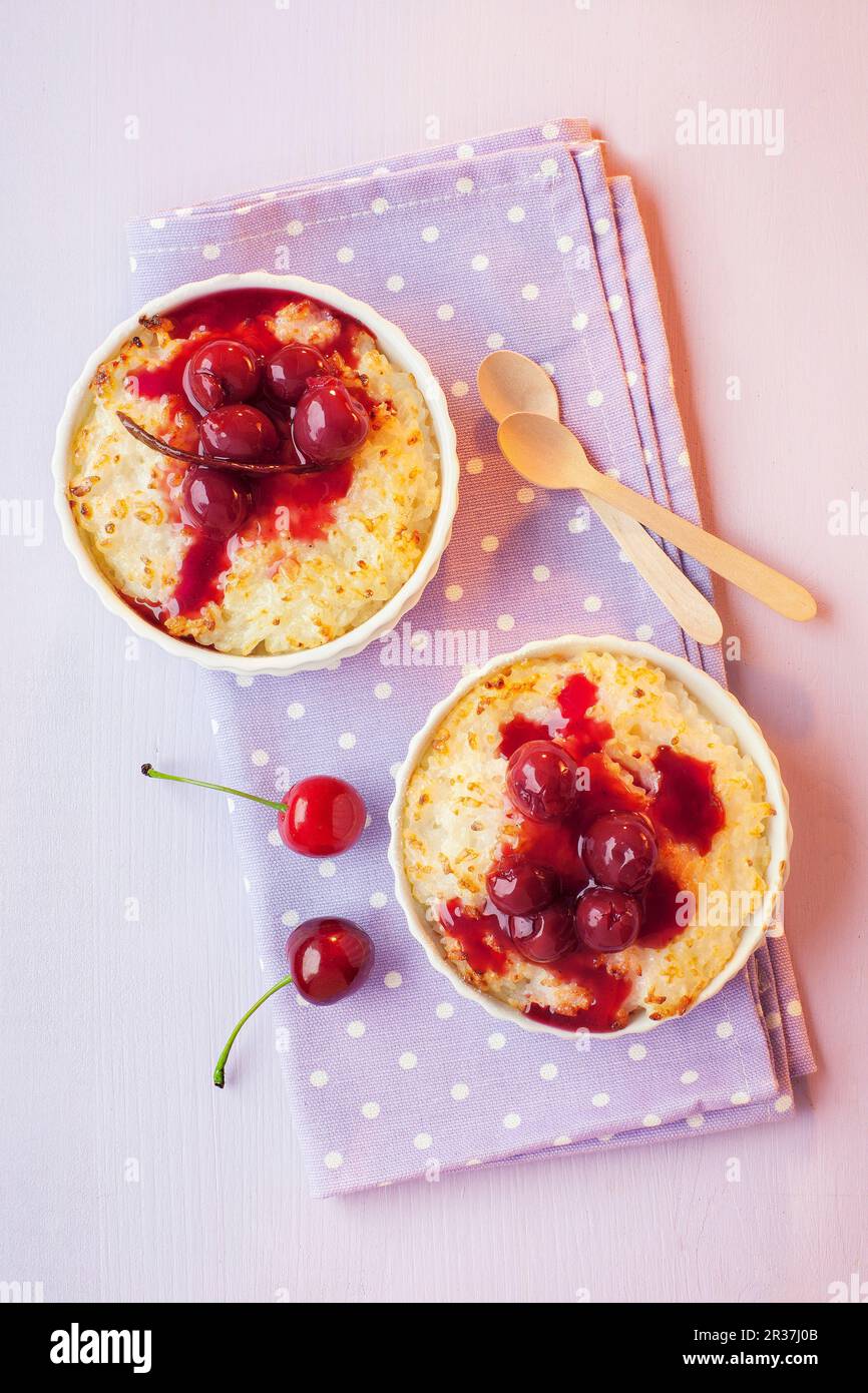 Rice pudding with sour cherries Stock Photo - Alamy