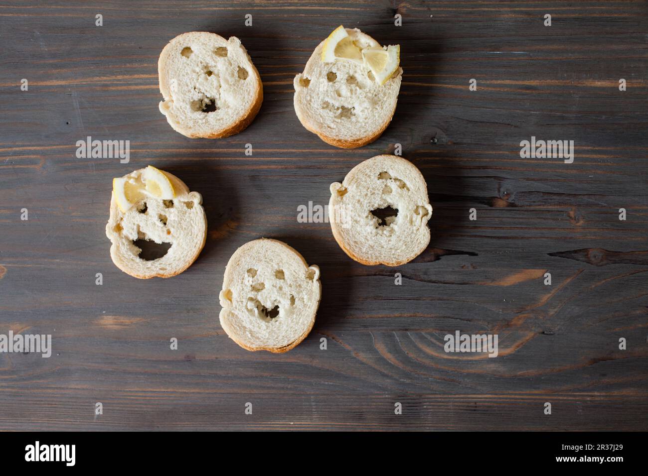 Faces from bread Stock Photo - Alamy